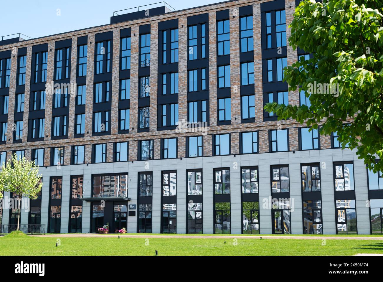 Modern Business Center in Kyiv with a green grass. office building ...