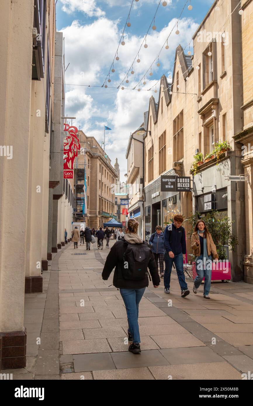 Petty Cury a busy pedestrian street in Cambridge with people walking ...