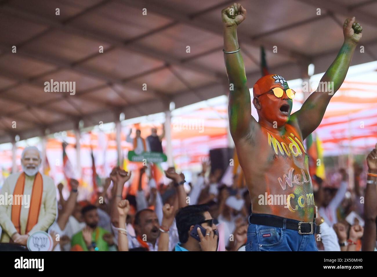 Supporters of the BJP at a rally of Prime Minister Narendra Modi ahead ...