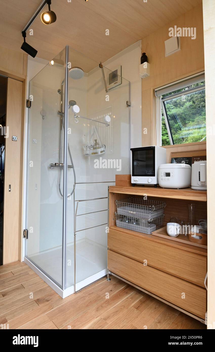 MUJI HOUSE unveils a shower room in the Utility unit of the "Zero Infrastructure House ...