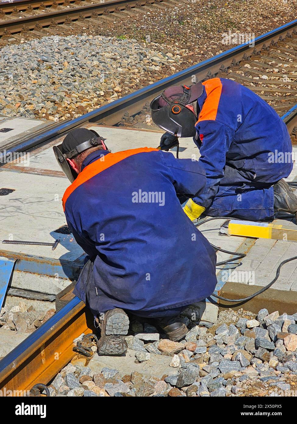 a two welders at a construction site Stock Photo - Alamy