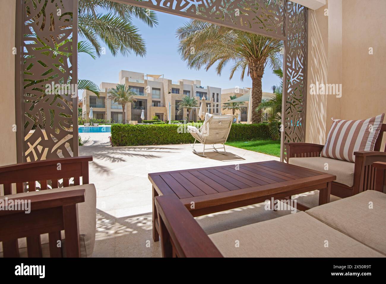 Garden patio terrace of a luxury apartment home in tropical resort with ...