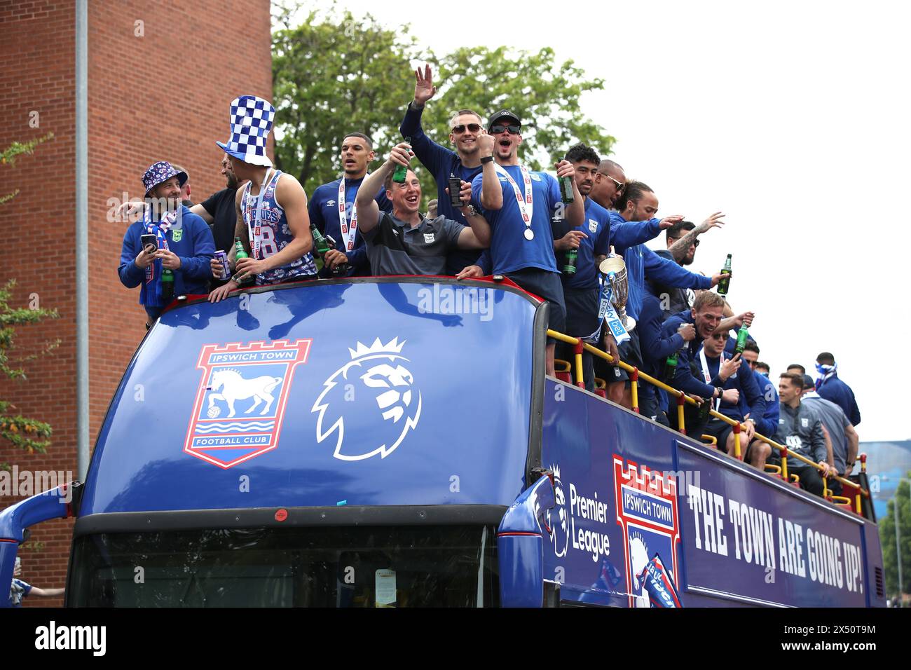 Ipswich Town players during an open-top bus parade in Ipswich to ...