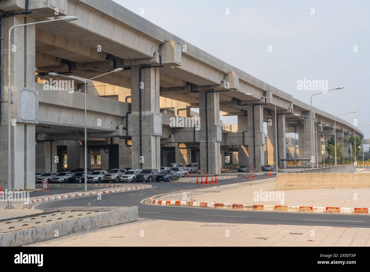 Under the expressway rail road of the bridge. Parking for cars under ...