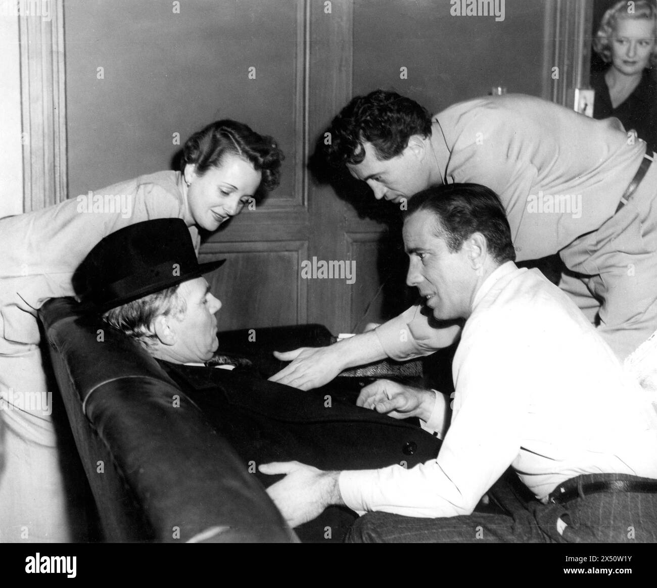 HUMPHREY BOGART, MARY ASTOR and LEE PATRICK with JOHN HUSTON directing ...