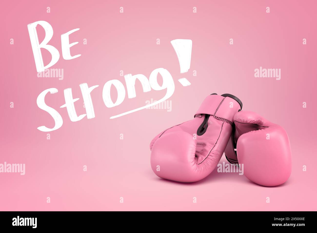 Pink boxing gloves with motivational text Stock Photo - Alamy