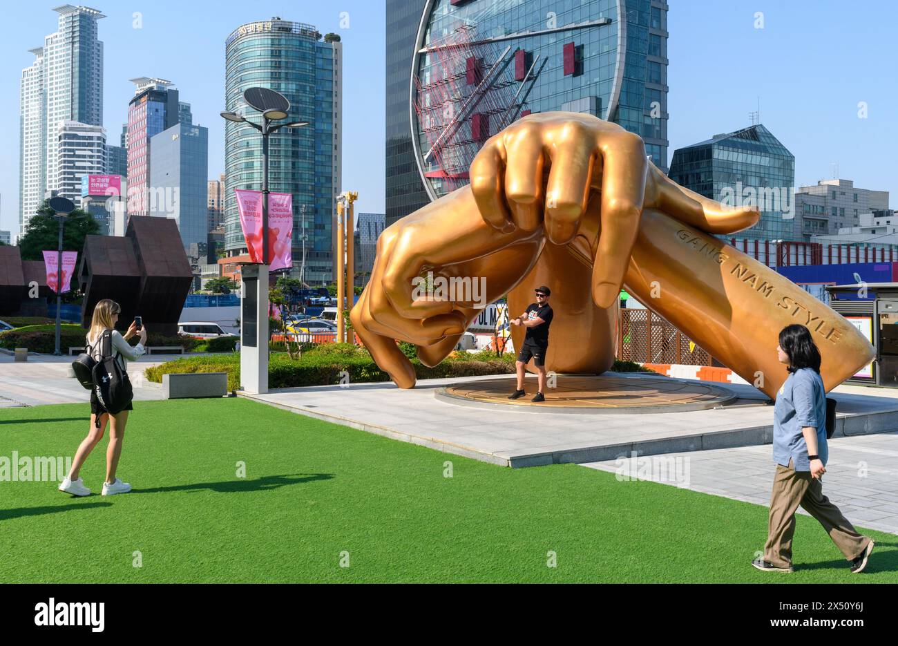 Seoul, South Korea. 03rd May, 2024. People take photos with a Statue of ...