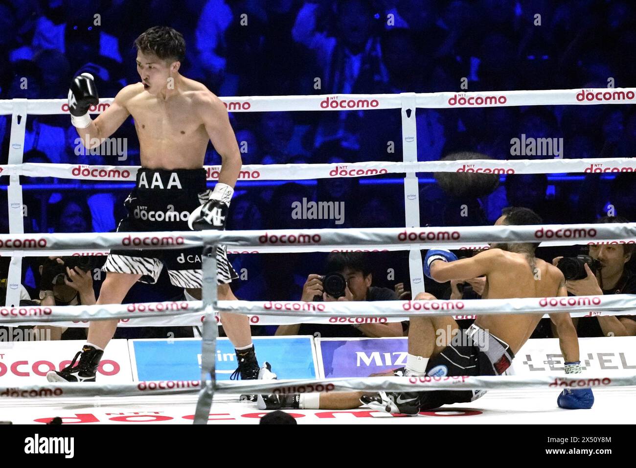 Naoya Inoue of Japan hits Luis Nery of Mexico in the second round of a boxing match for the ...