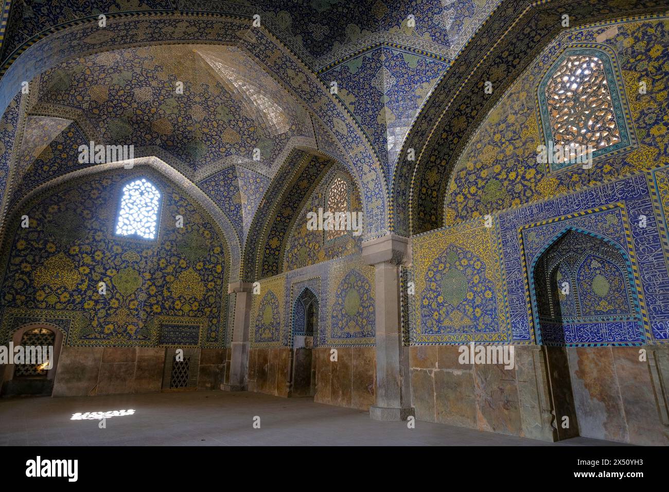 Isfahan, Iran - March 30, 2024: Interior of the Shah Mosque, also known ...