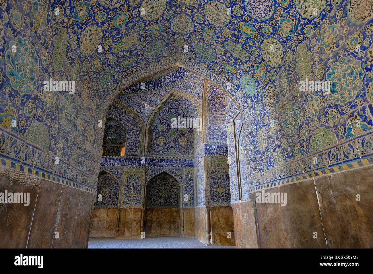 Isfahan, Iran - March 30, 2024: Interior of the Shah Mosque, also known ...