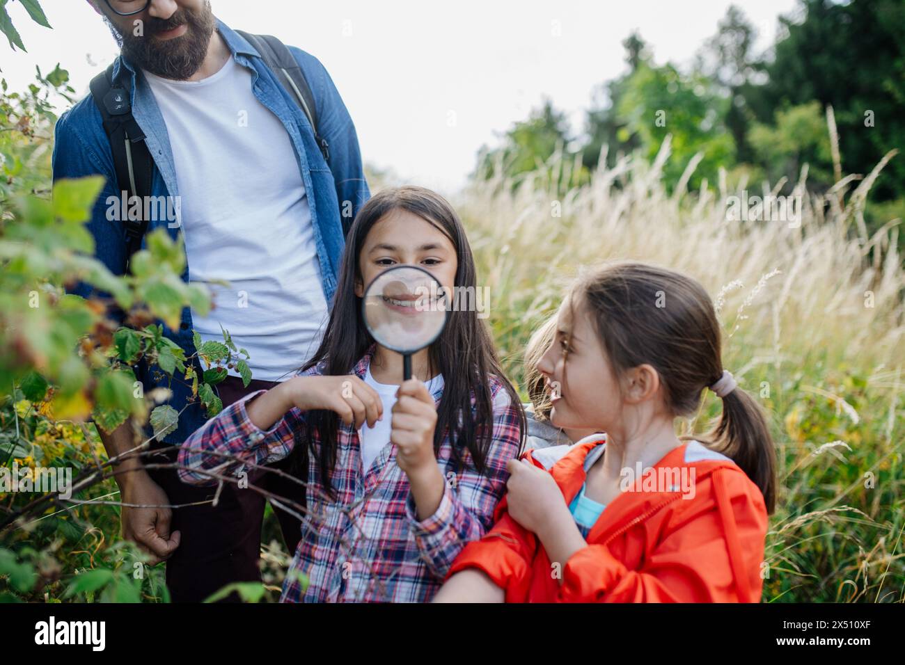Young students learning about nature, forest ecosystem during biology ...