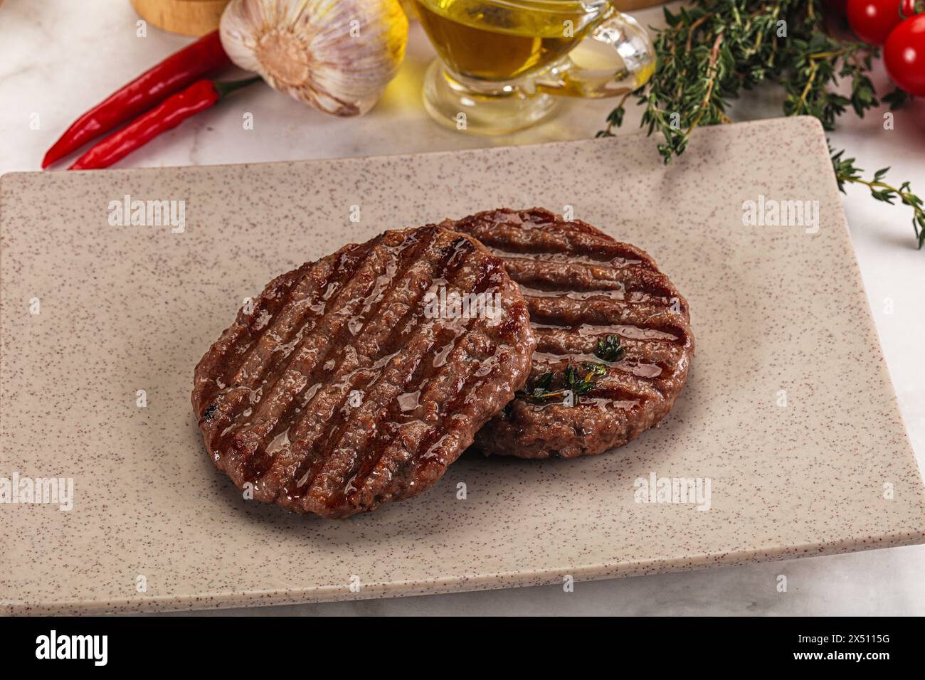 Grilled beef minced meat cutlet for burger Stock Photo - Alamy