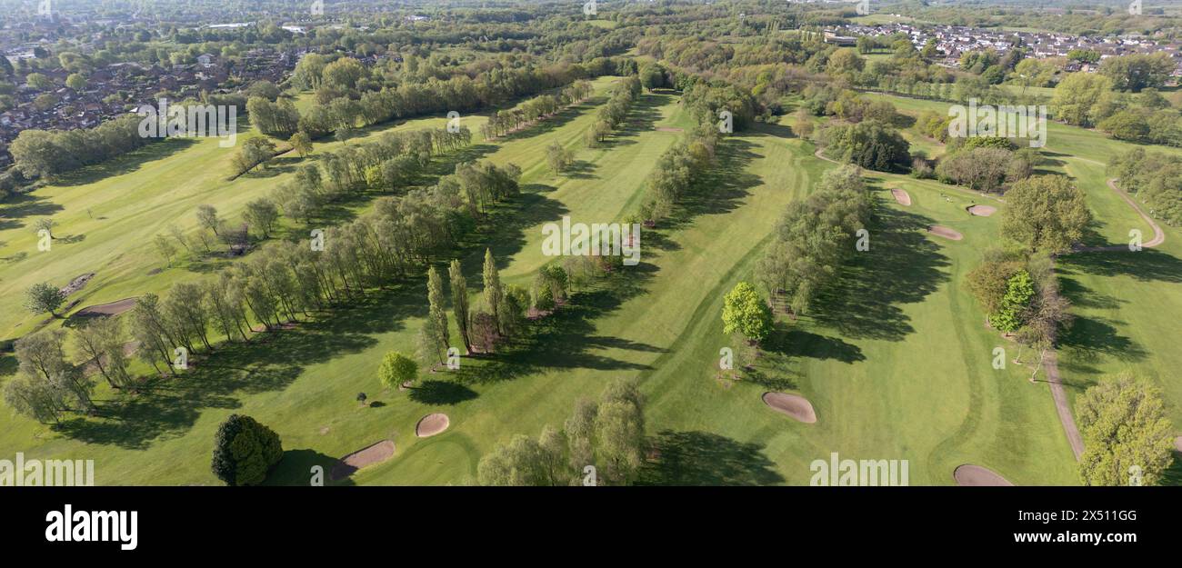 Aerial view of the golf course, Greater Manchester, UK. Green fairways ...