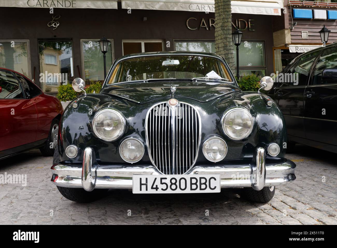 Old classic green Jaguar 3.8 liter front view Stock Photo - Alamy