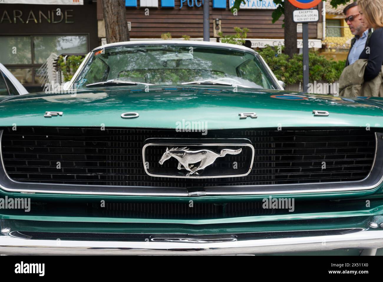green old classic ford mustang front details Stock Photo - Alamy
