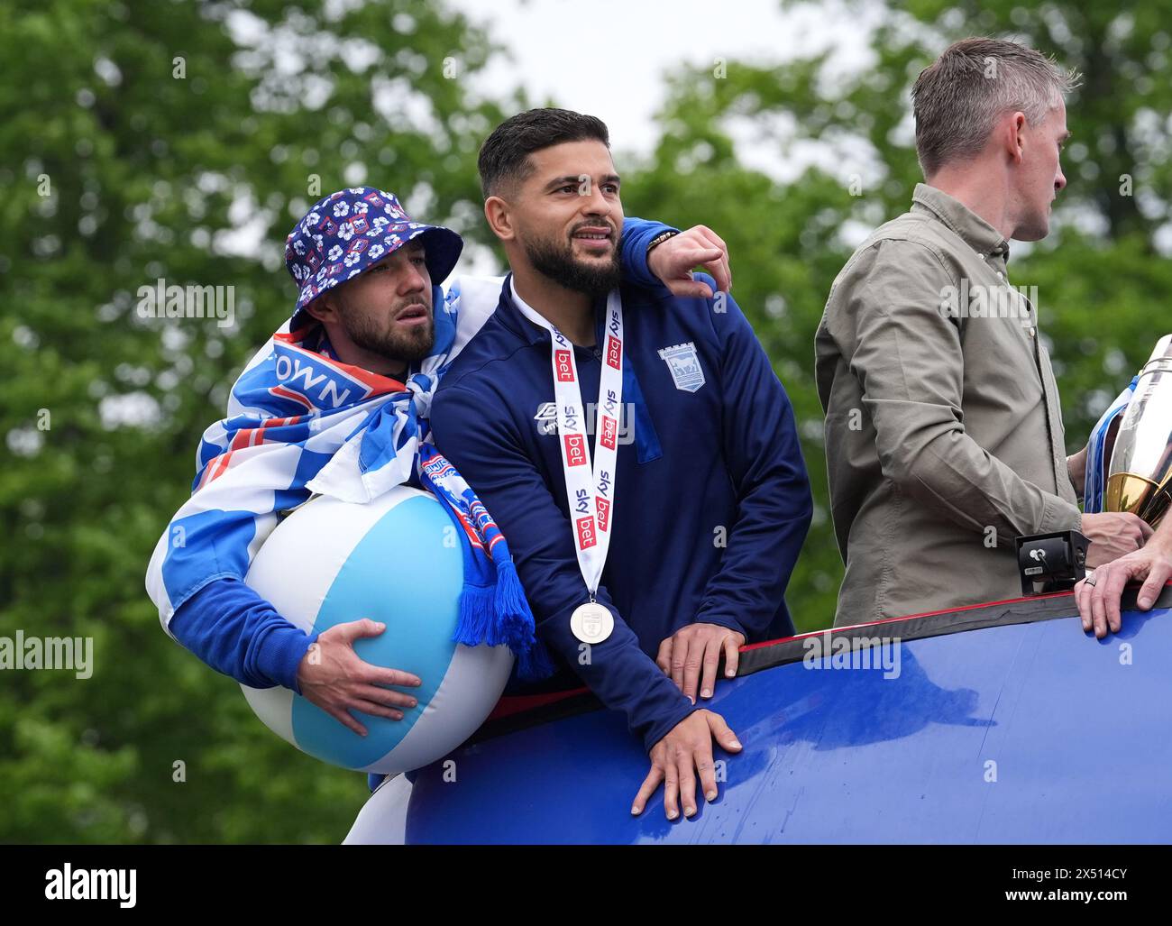 Ipswich Towns' Sam Morsy (centre) during an open-top bus parade in ...