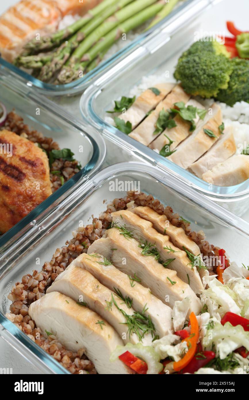 Healthy food. Different meals in glass containers on table Stock Photo ...
