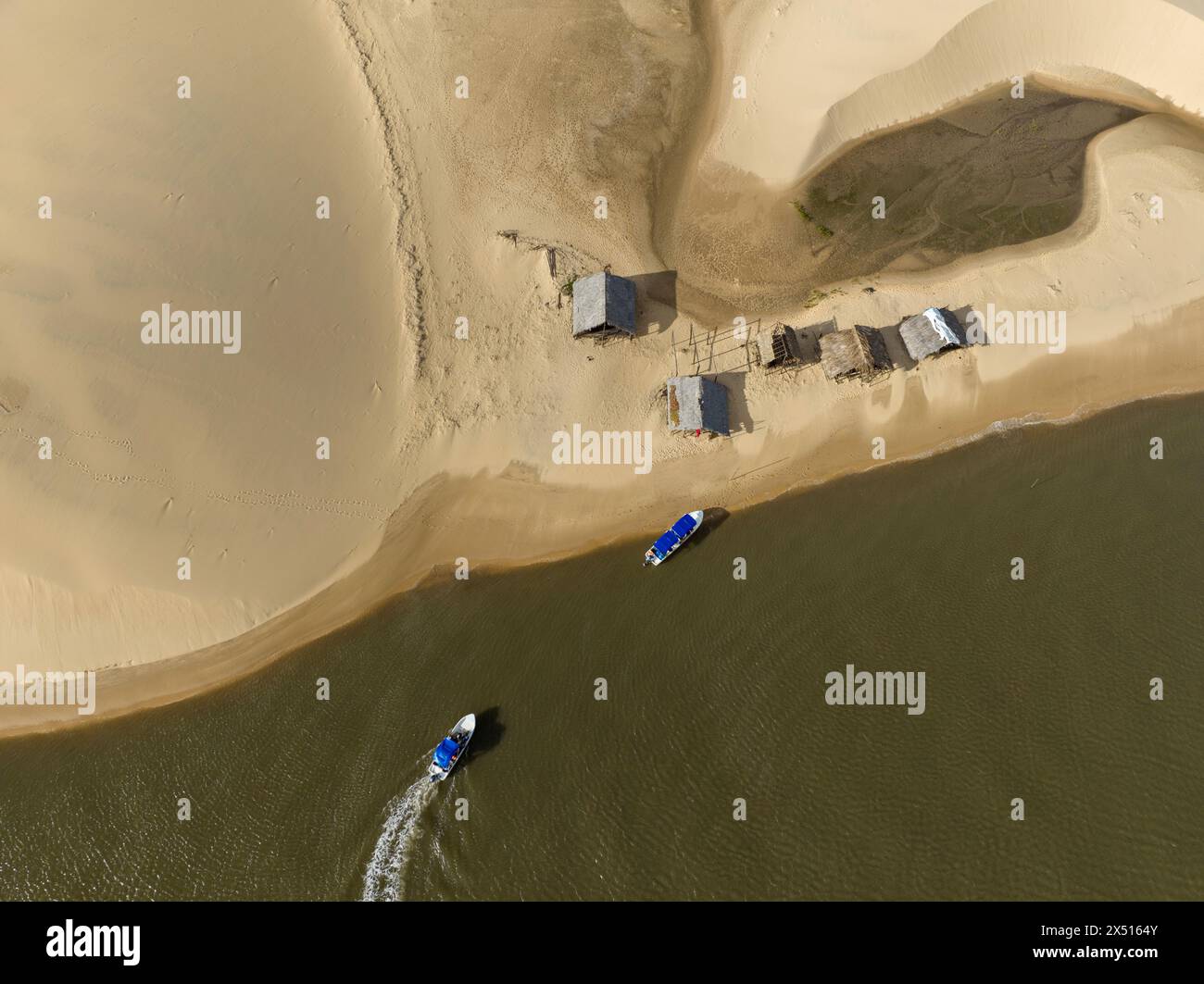 Aerial view of Parque da Dunas - Ilha das Canarias, Brazil. Huts on the ...