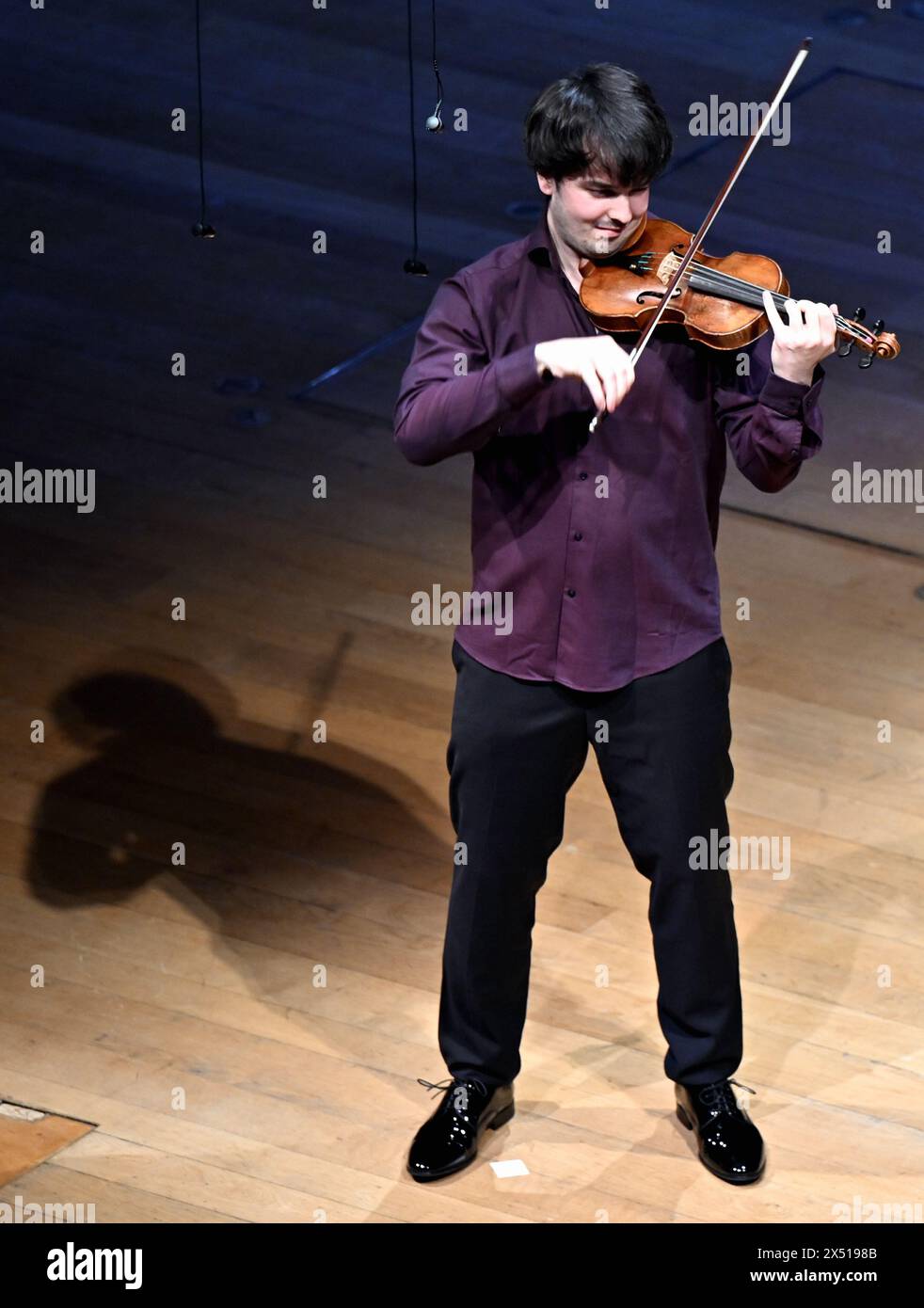 Slovenian violinist Rok Zaletel Cernos performs during a royal visit to ...
