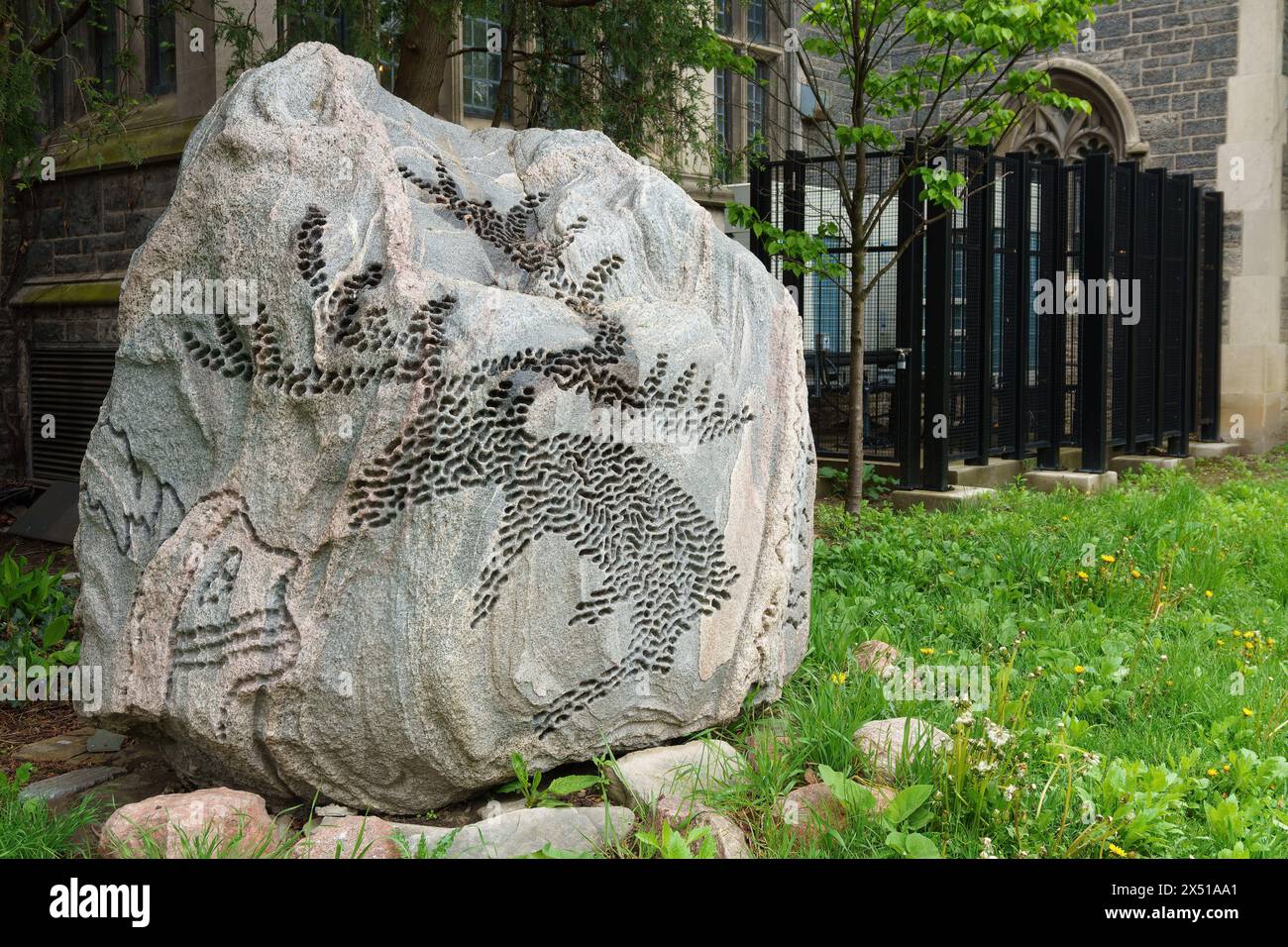 Sculpture art on a boulder in Toronto, Canada Stock Photo - Alamy