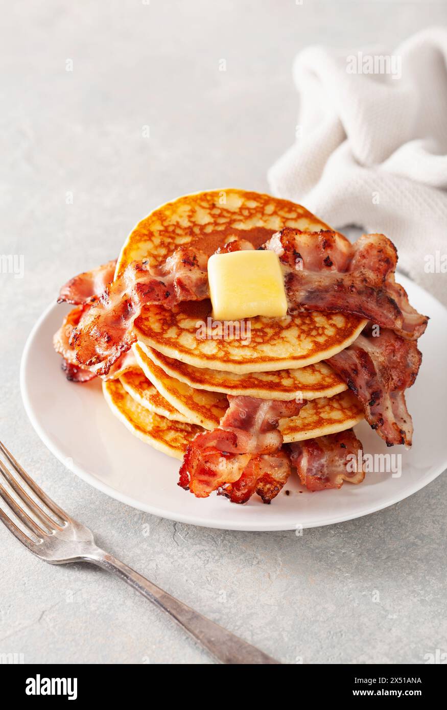 sweet pancakes with butter and bacon. traditional american breakfast ...