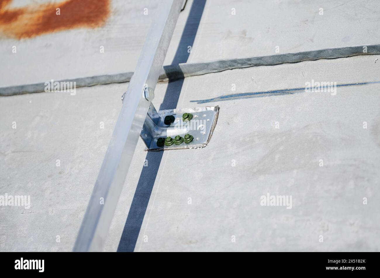 Close up view of metal bracket used for mounting solar panels on flat ...