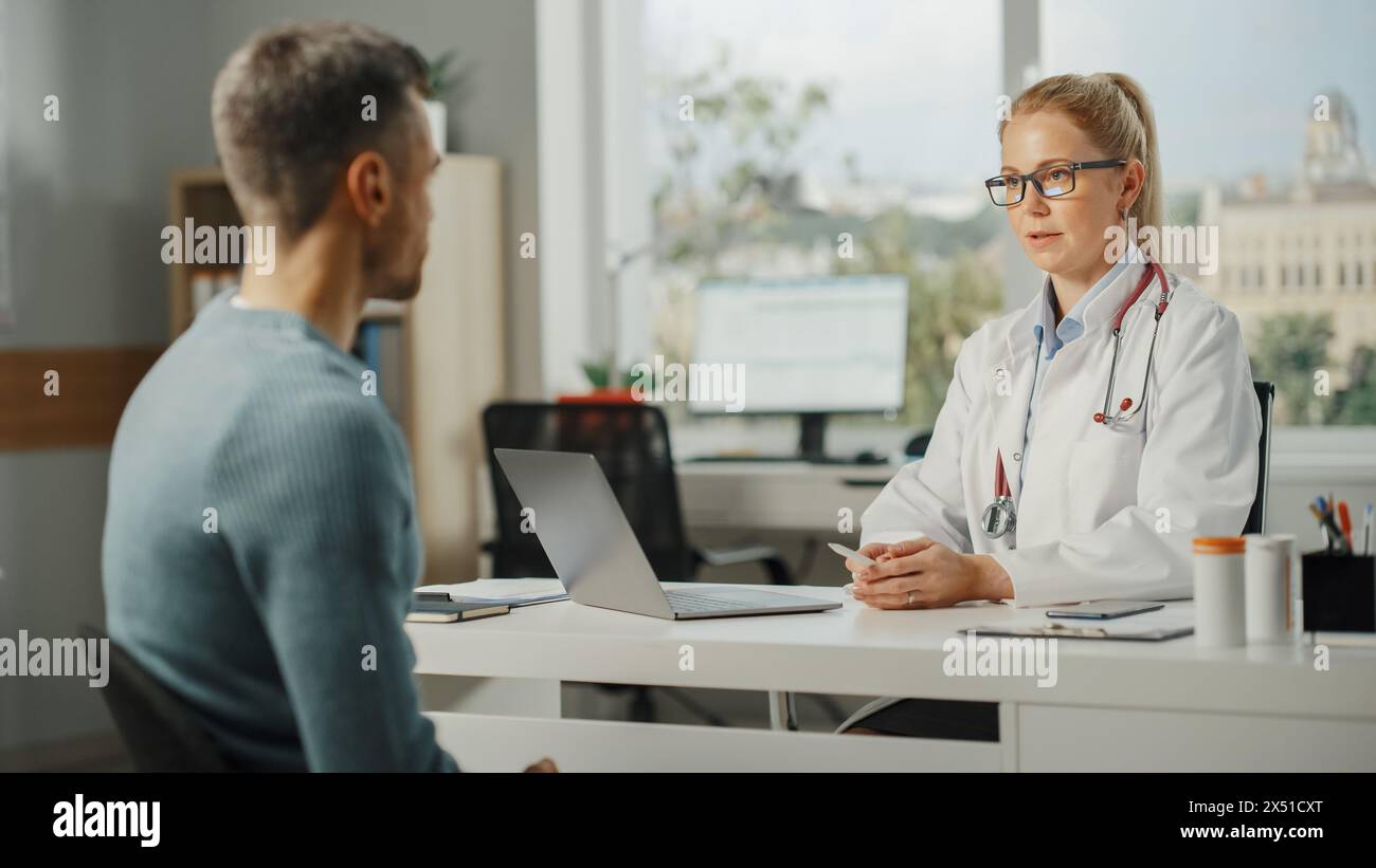 Doctor nurse sitting behind a desk hi-res stock photography and images ...