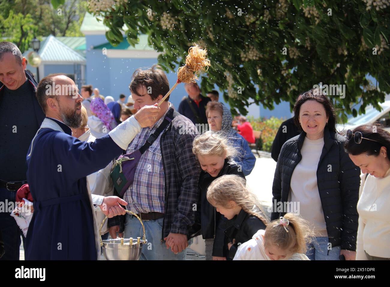 Non Exclusive: KYIV, UKRAINE - MAY 5, 2024 - A priest blesses people ...