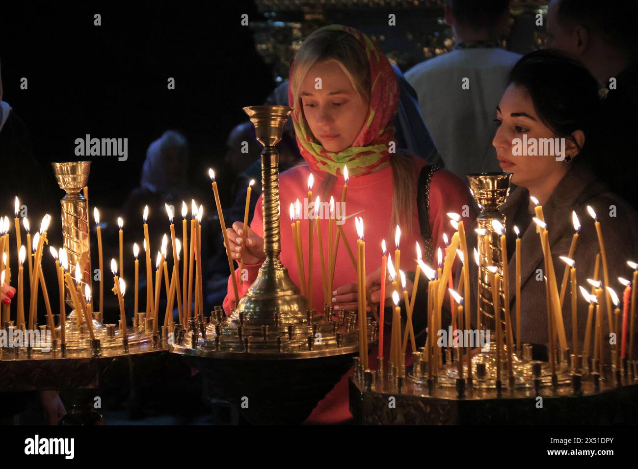 Non Exclusive: KYIV, UKRAINE - MAY 5, 2024 - Women place burning ...