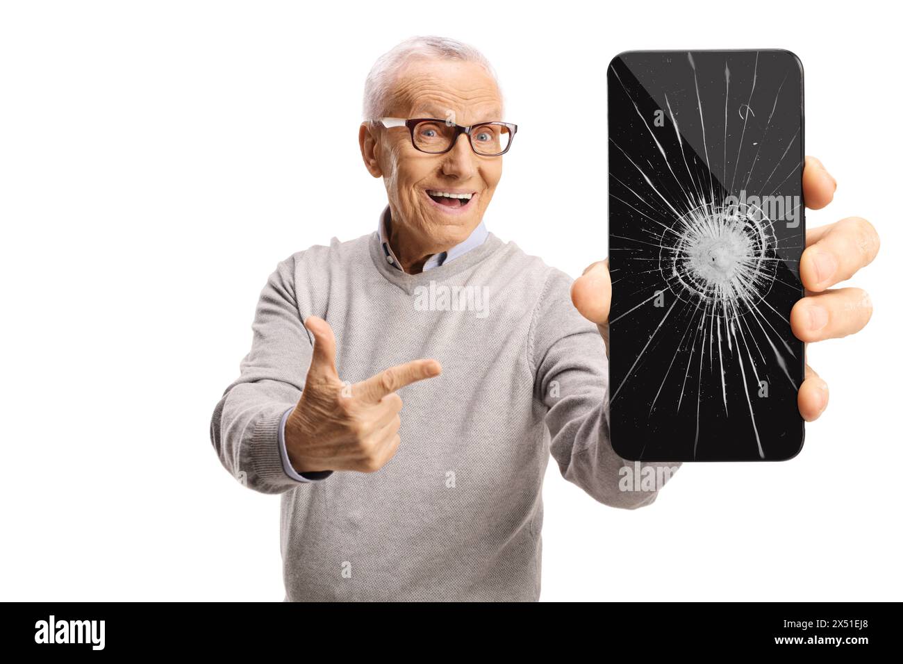 Senior man pointing at a smartphone with broken screen isolated on ...