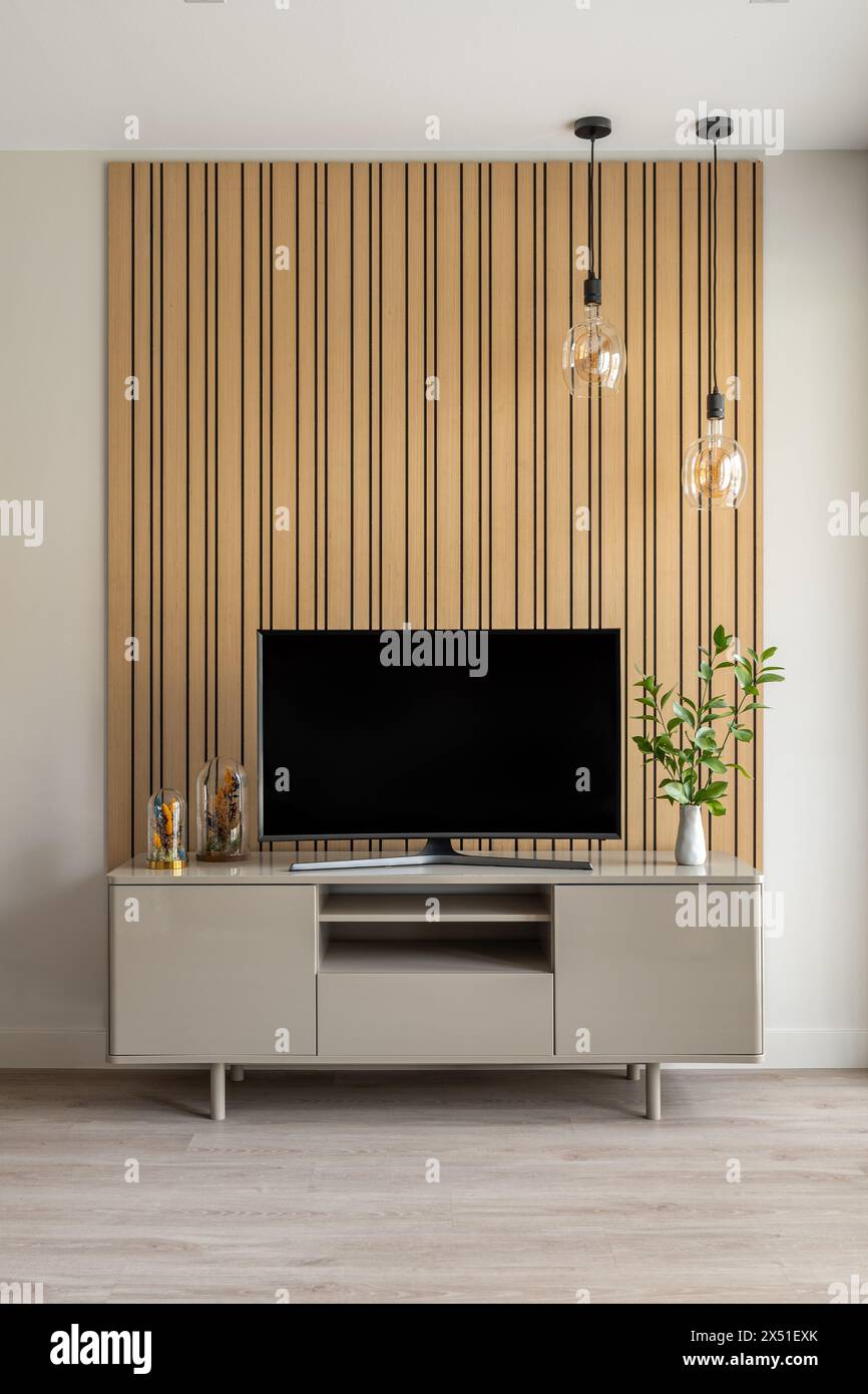 Focused View of Modern TV Stand Against Wooden Panel Backdrop Stock ...