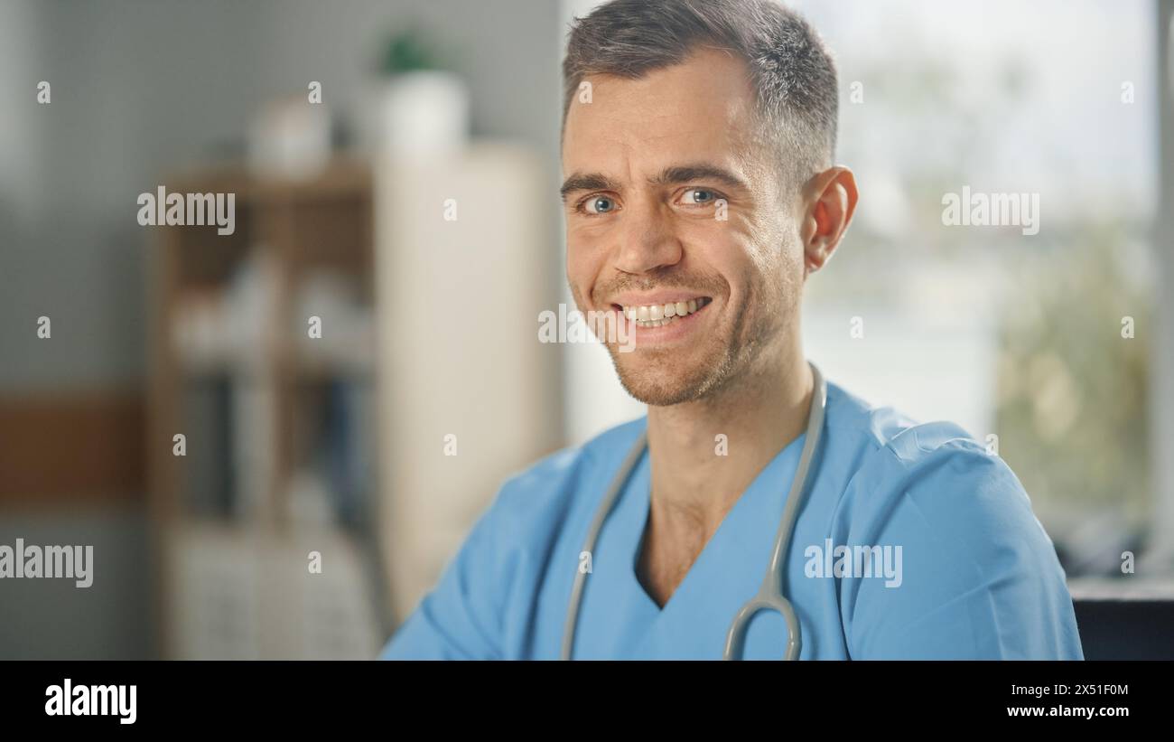 Portrait of Experienced Male Nurse Wearing Blue Uniform Smiling at ...