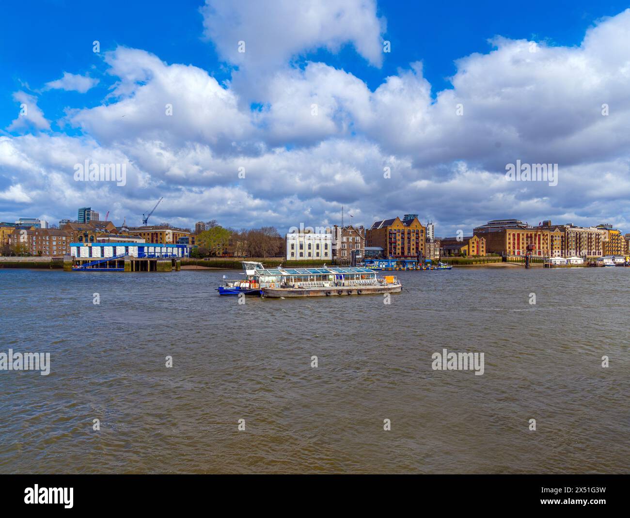 Tourist boat transporting passengers and tourists, anchored with a ...