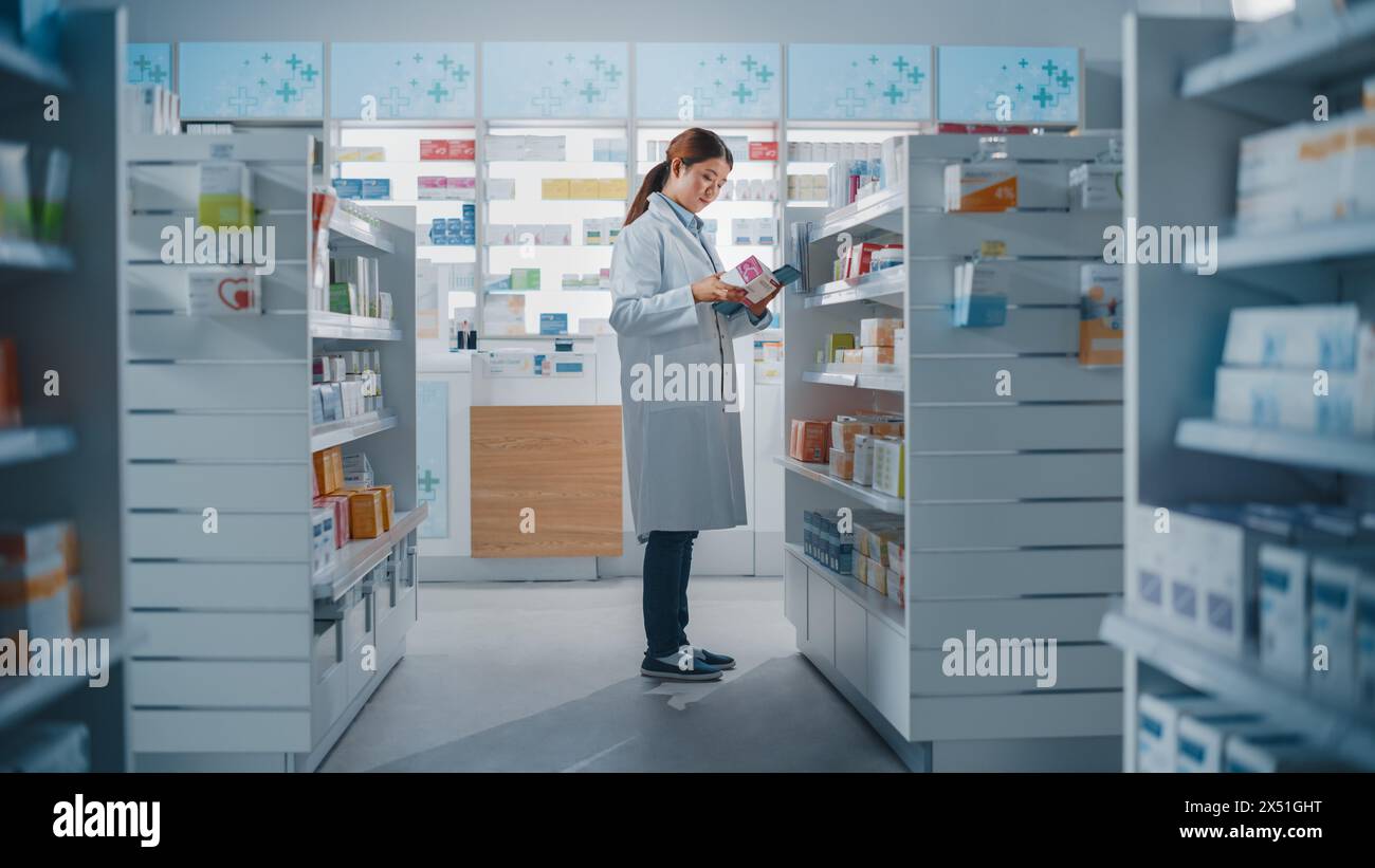 Young chinese woman checks hi-res stock photography and images - Alamy