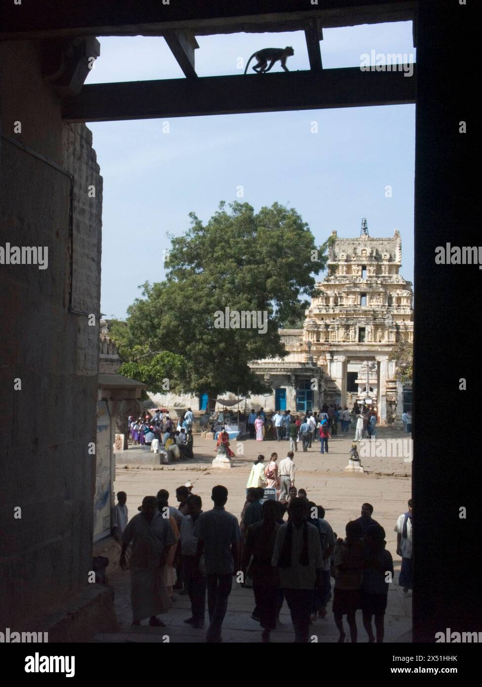 Hindu pilgrims enter the temple at Hampi, Karnataka, India Stock Photo ...