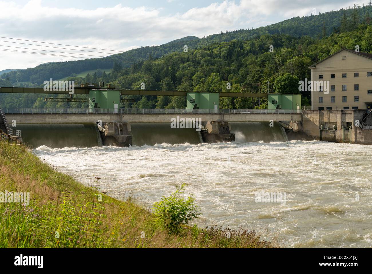 Hydroelectric power plant after heavy rain, with rapidly flowing water ...