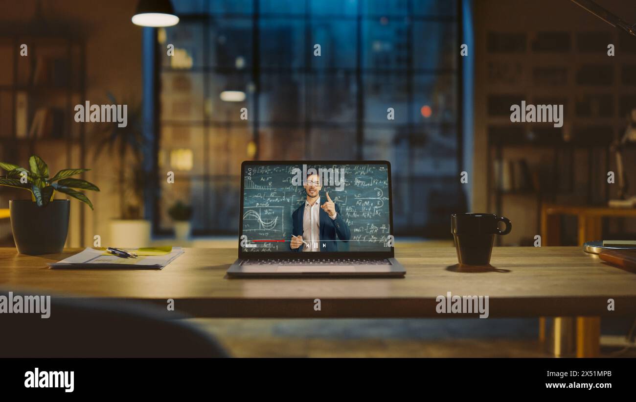 Shot of a Laptop Computer Standing on the Wooden Desk Showing Online ...