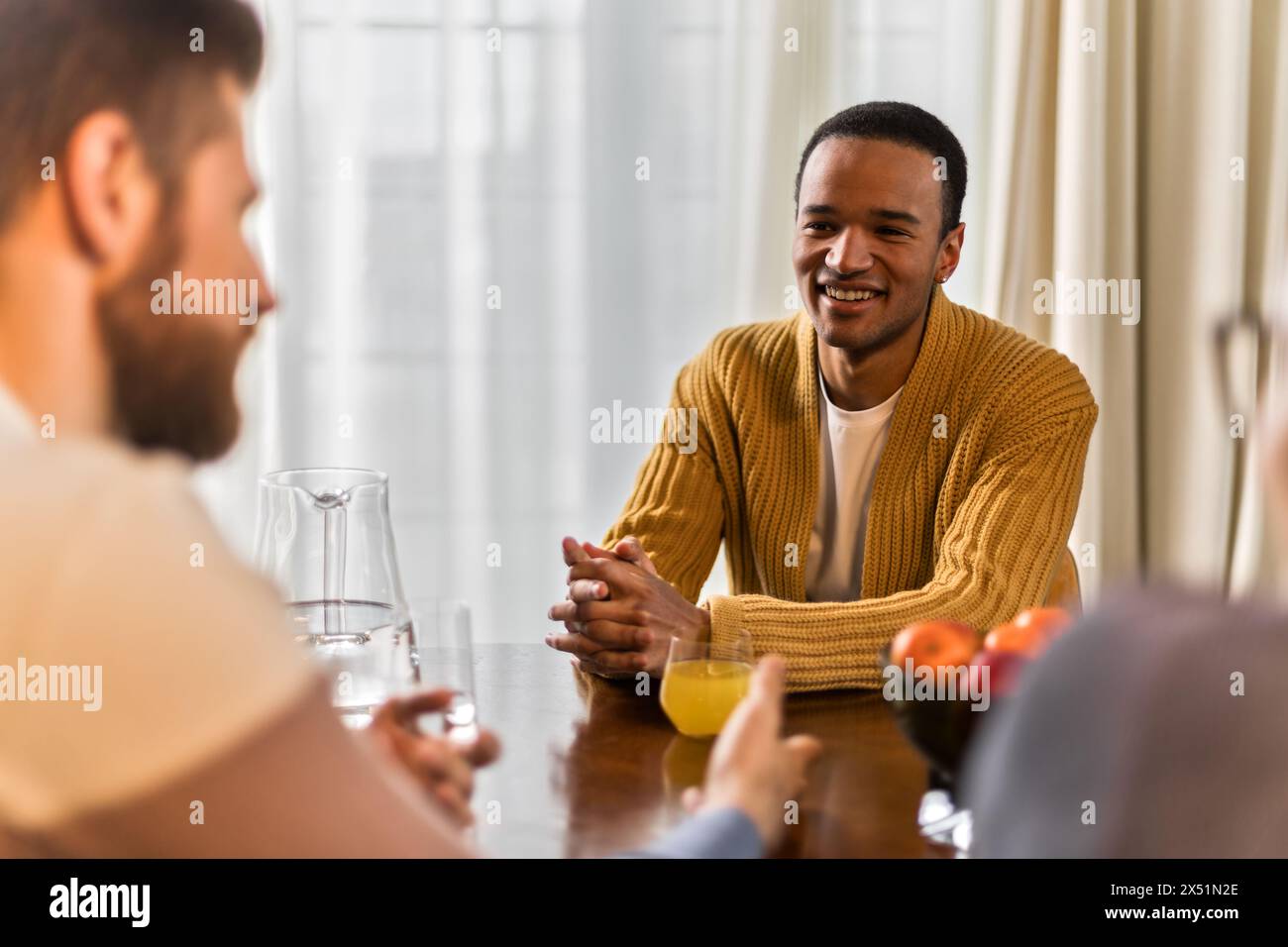 Male friends chatting hi-res stock photography and images - Alamy