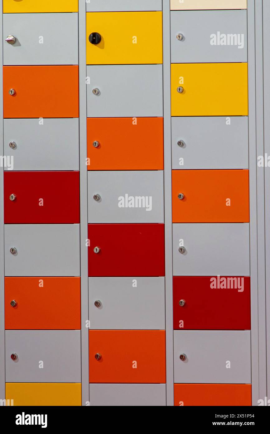 Closed storage compartments inside building interior wall Stock Photo ...