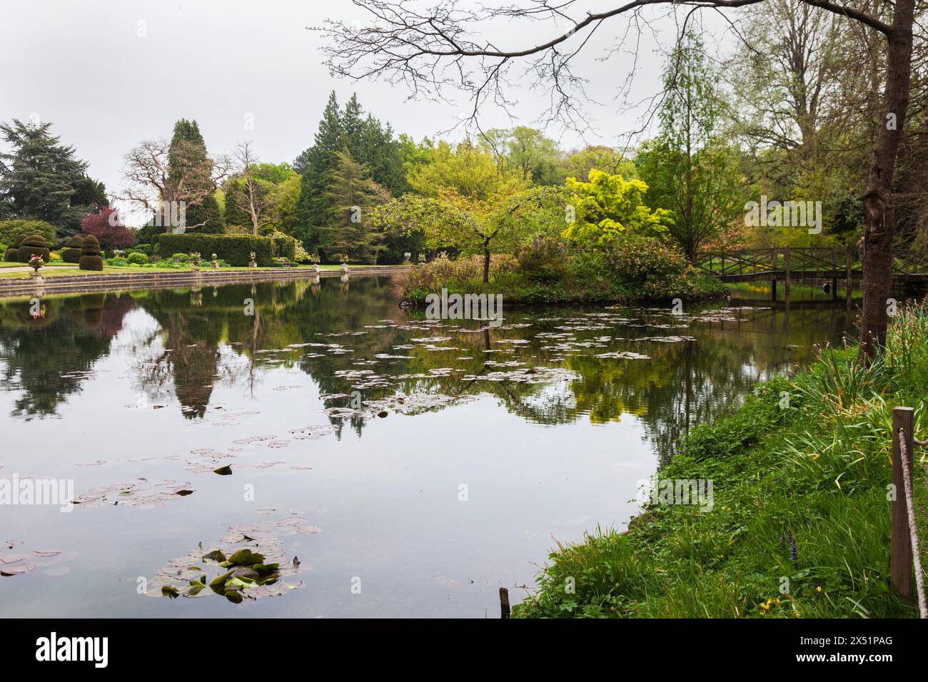 A scenic view of the lake,plants and gardens at Thorp Perrow Arboretum ...