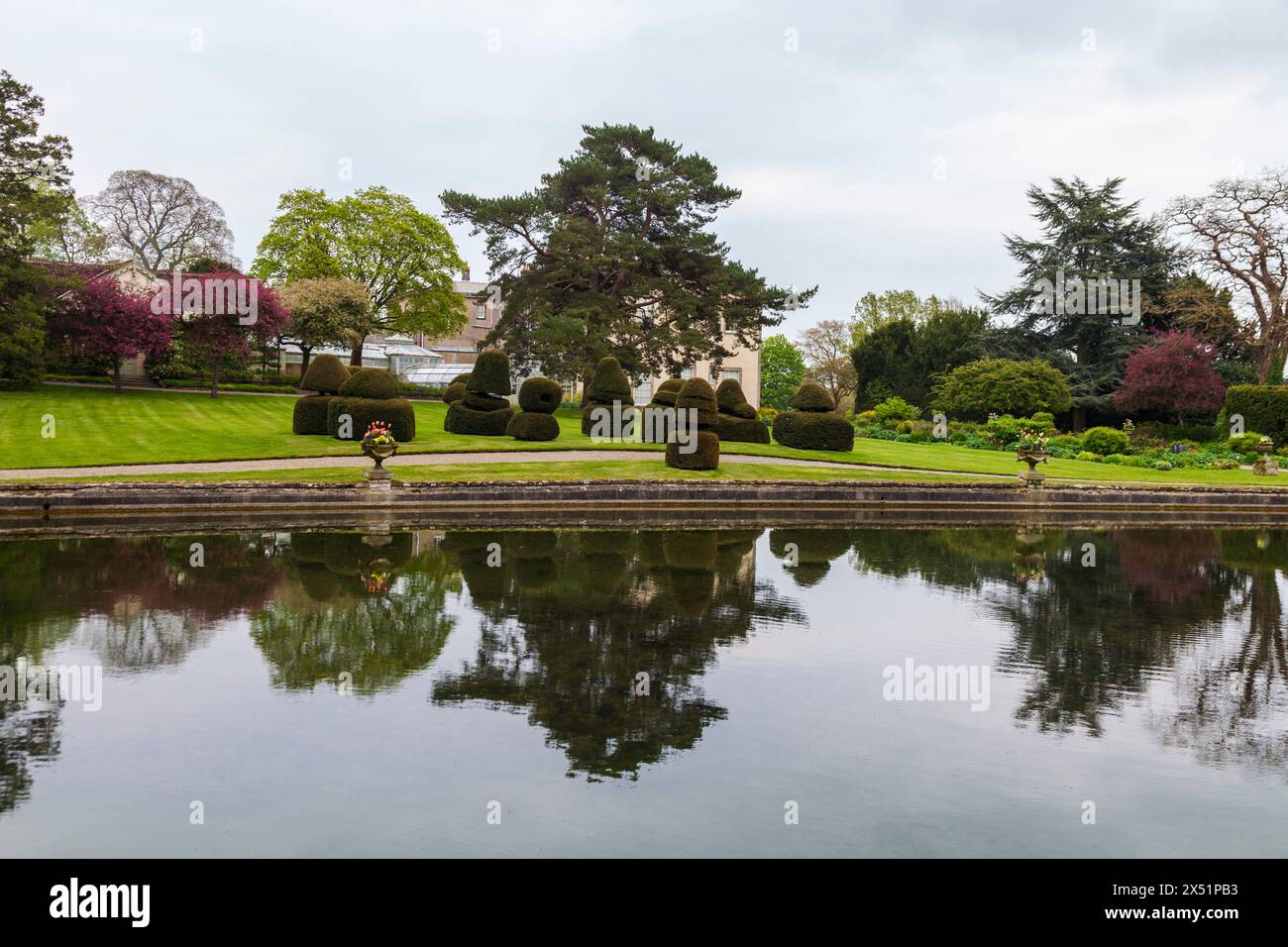 A scenic view of the lake,plants and gardens at Thorp Perrow Arboretum ...