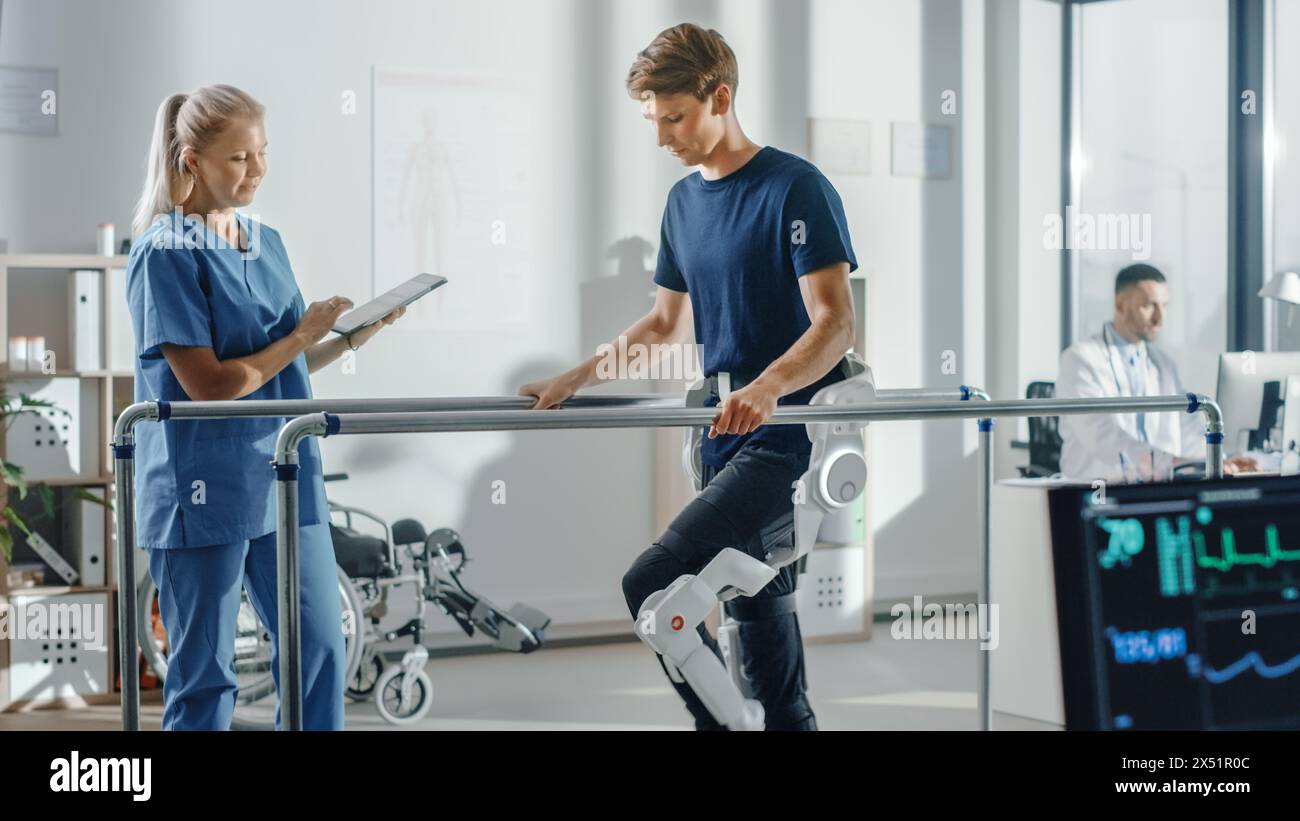 Modern Hospital Physical Therapy: Doctor Uses Tablet Computer, Helps ...