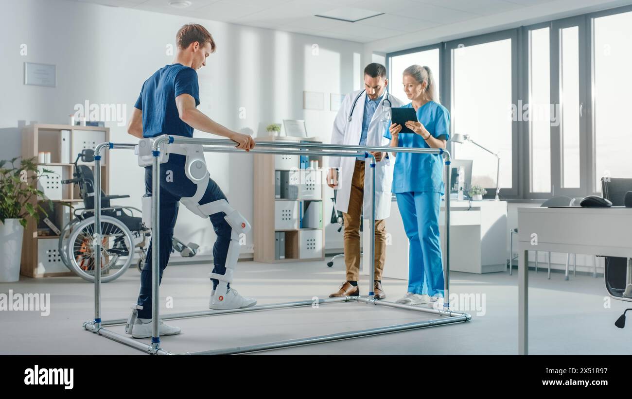 Modern Hospital High-Tech Physical Therapy: Patient with Back Injury ...