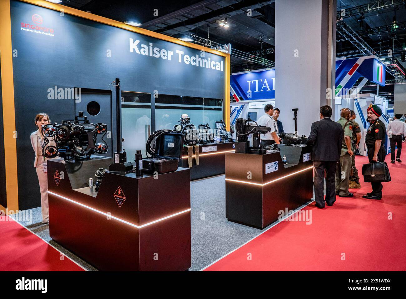 Visitors are seen visiting the Kaiser Technical booth from Singapore during the Defence Services ...