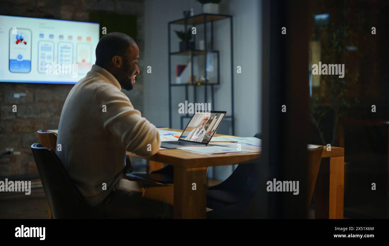 Handsome Black African American Project Manager is Making a Video Call ...