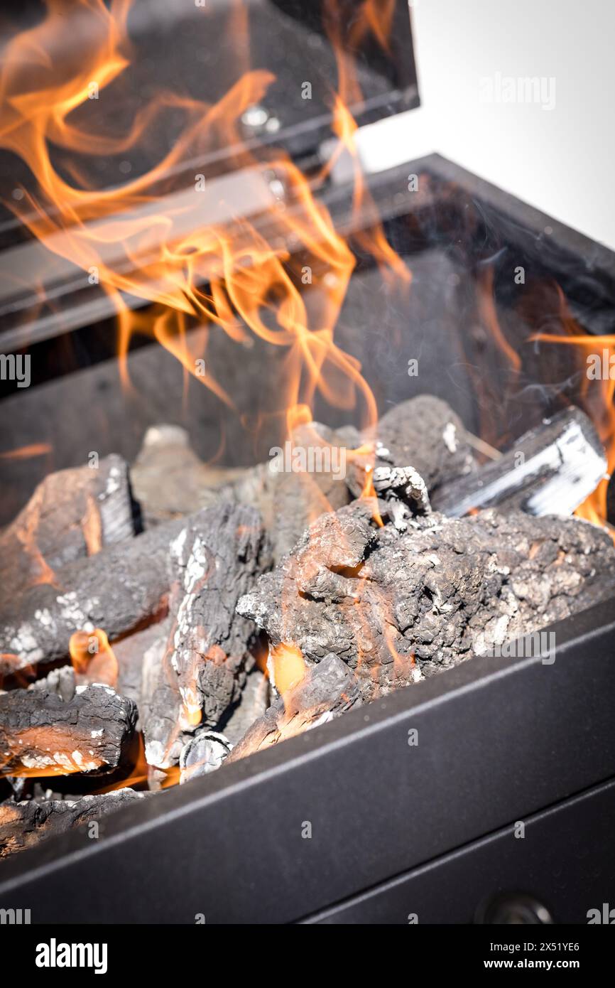 fire and embers for the barbecue, preparing to be ready to put on the ...