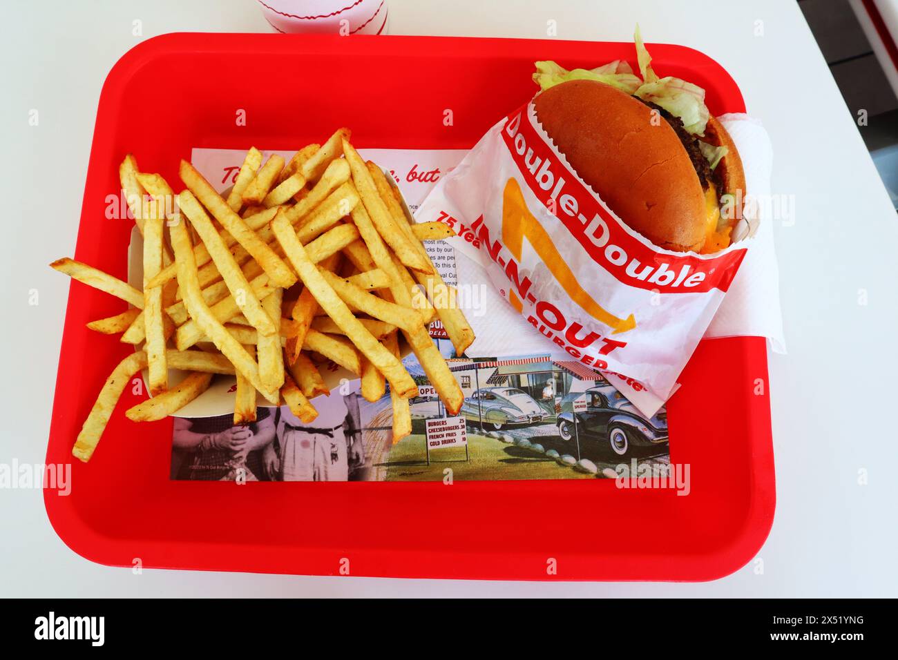 IN-N-OUT Burger, Double-Double Burger and French Fries in a tray on the ...