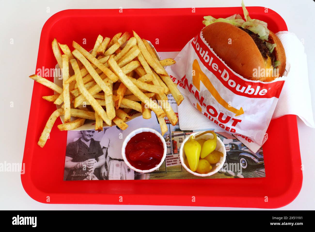 IN-N-OUT Burger, Double-Double Burger and French Fries in a tray on the ...