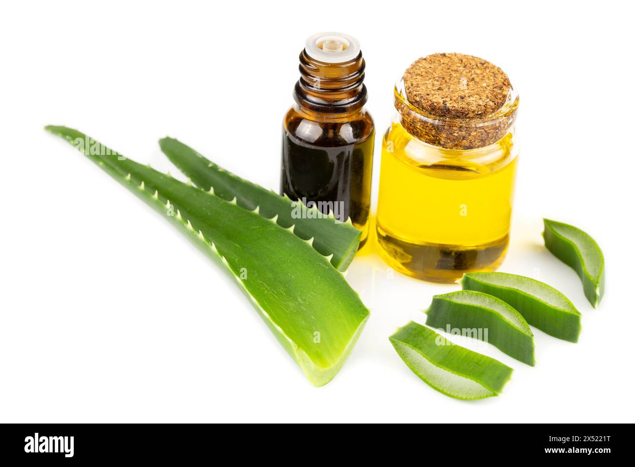 Aloe vera sloces, essential oil and essence on white background Stock ...