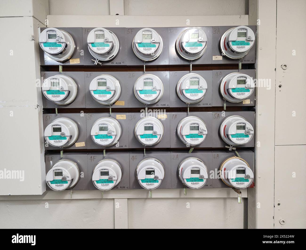 Electric meters in Apartment Building Stock Photo - Alamy